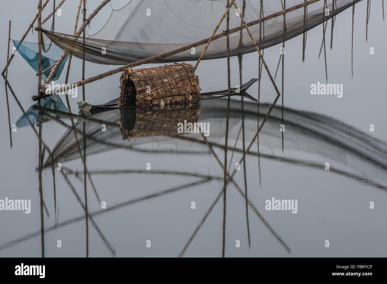Fishing nets set up by the local indigenous Mishing people. At dawn on ...