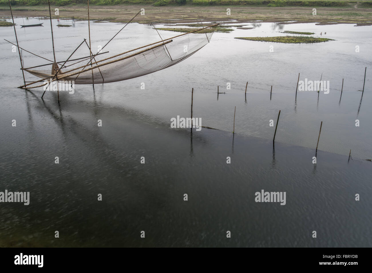 Fishing nets set up by the local indigenous Mishing people. At dawn on ...