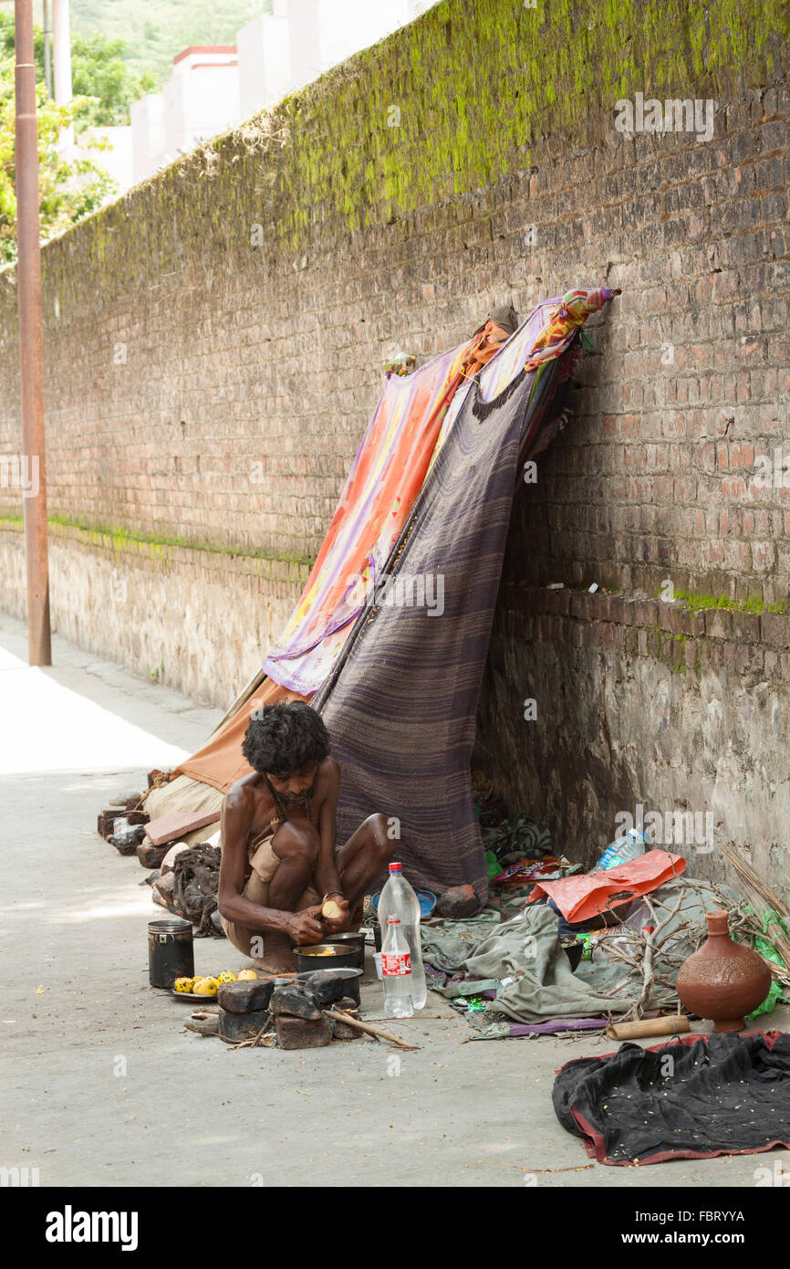 A poor pilgrim living on the street in Rishikesh, India Stock Photo - Alamy