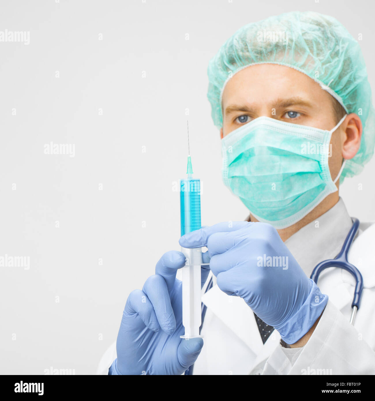 Doctor with syringe in hands preparing for making injection - close up ...