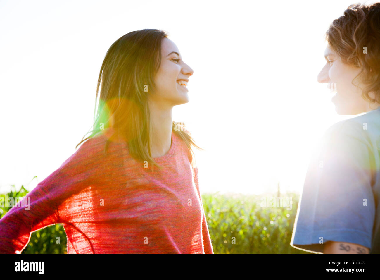 Young couple chatting Stock Photo - Alamy