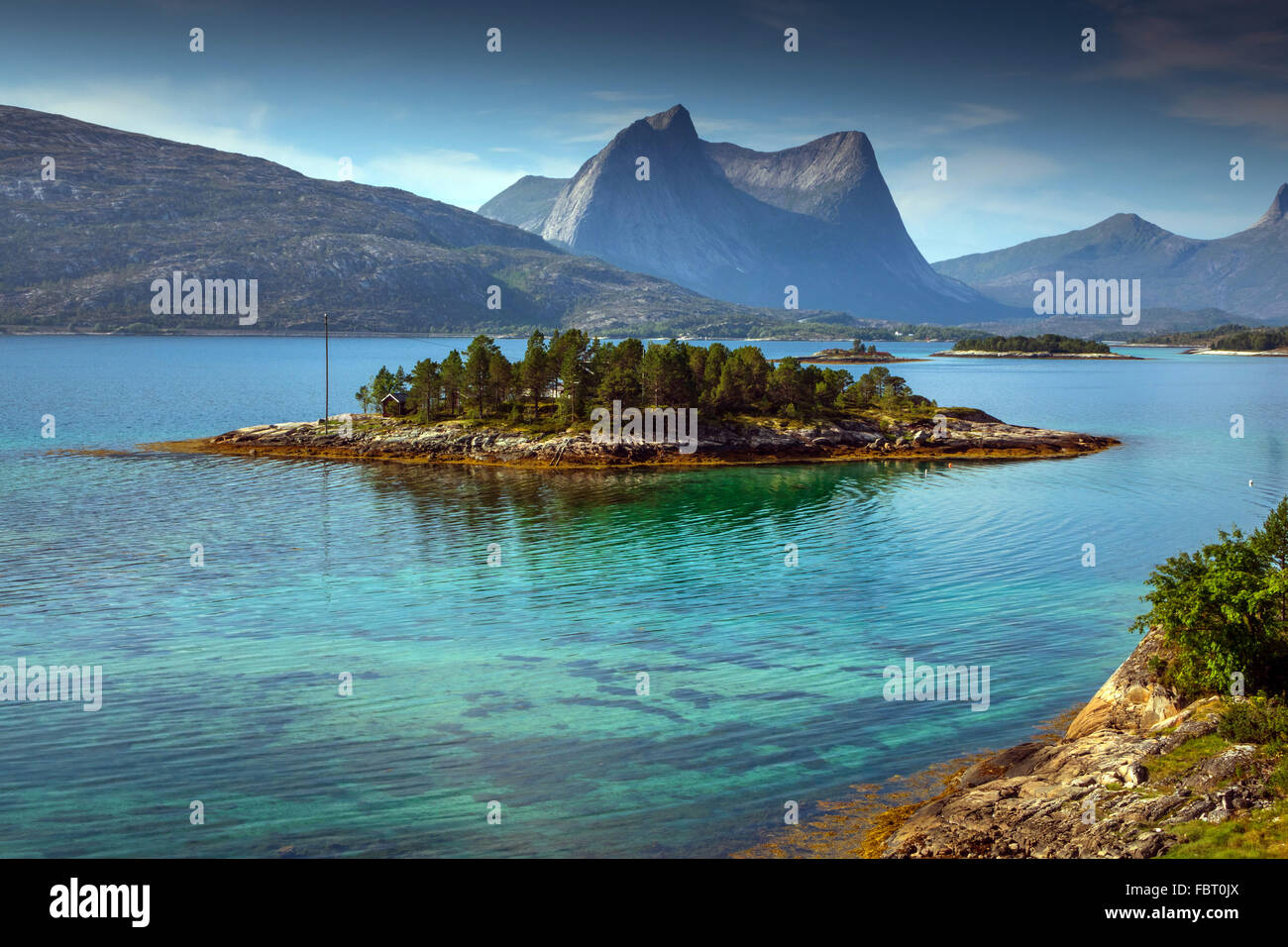 Eidetinden, seen over Efjorden with small island in foreground Stock ...