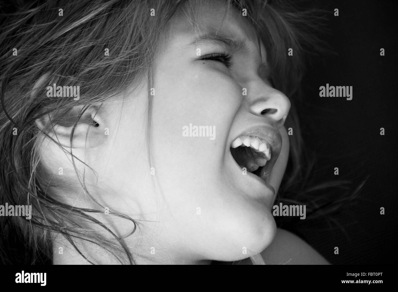 Expression of desperate on the face of a child Stock Photo - Alamy