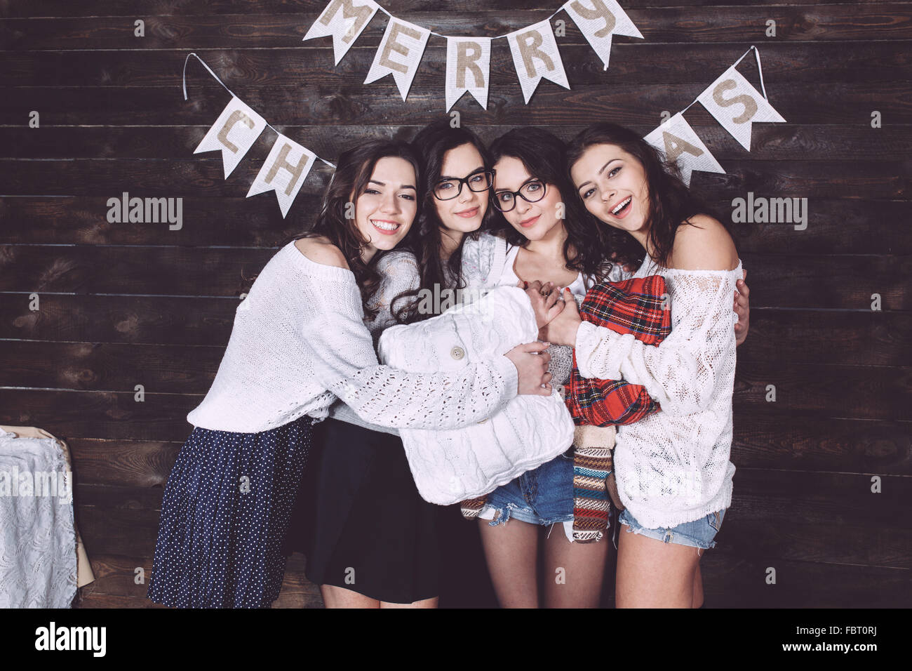 Cute girl hug and pose for the camera Stock Photo - Alamy