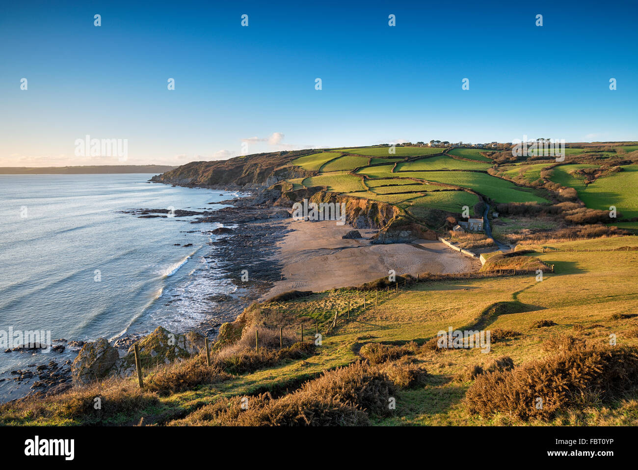 Walking the South West Coast Path as it descends from Dodman point to ...