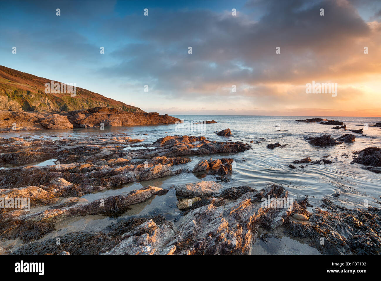 Sunset from Hemmick beach near Gorran Haven in Cornwall Stock Photo - Alamy