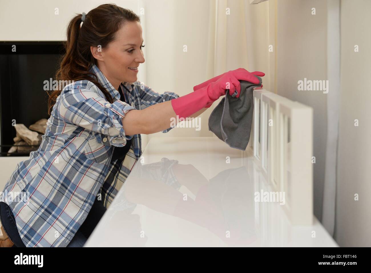 A woman is cleaning her house, Germany, city of Seesen, 18. January ...
