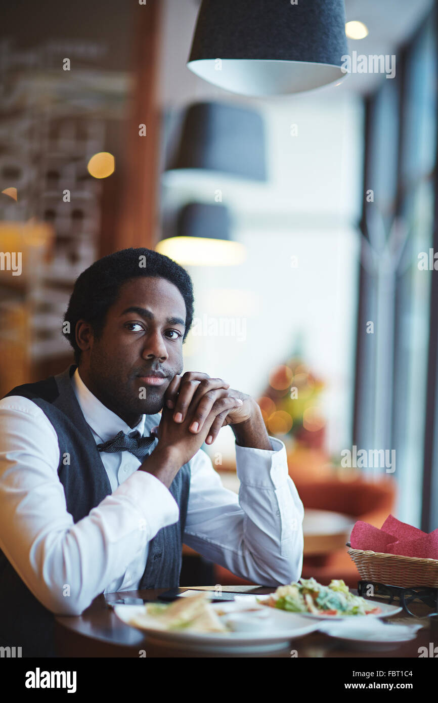 Man sitting in cafe hi-res stock photography and images - Alamy