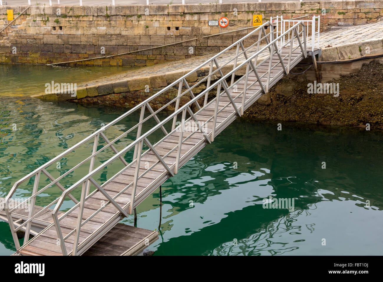 Jetty in a Marina gateway Stock Photo - Alamy