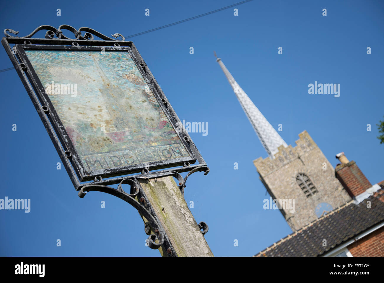 Middleton Village sign with church in background. Suffolk Stock Photo ...