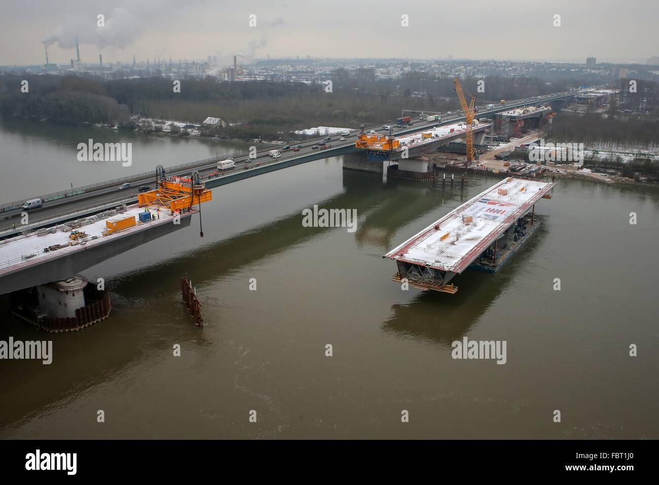 Mainz, Germany . 19th Jan, 2016. A bridge segment is moved by a pontoon ...
