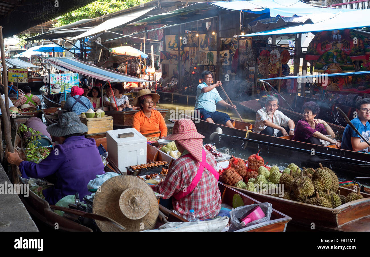 Floating Market with boats and sellers on a canal or Khlong, Damnoen ...