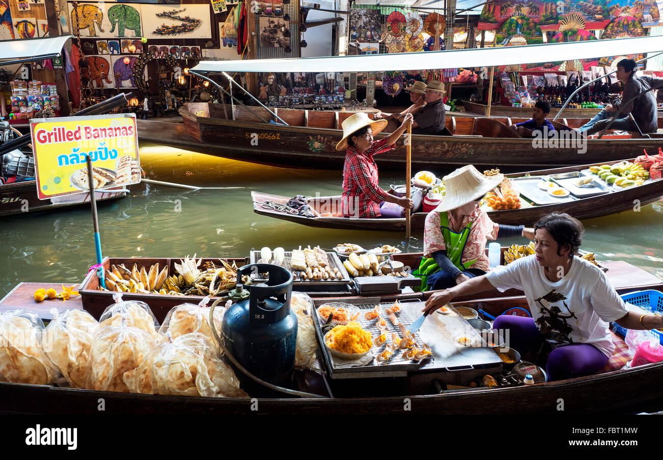 Floating Market with boats and sellers on a canal or Khlong, Damnoen ...