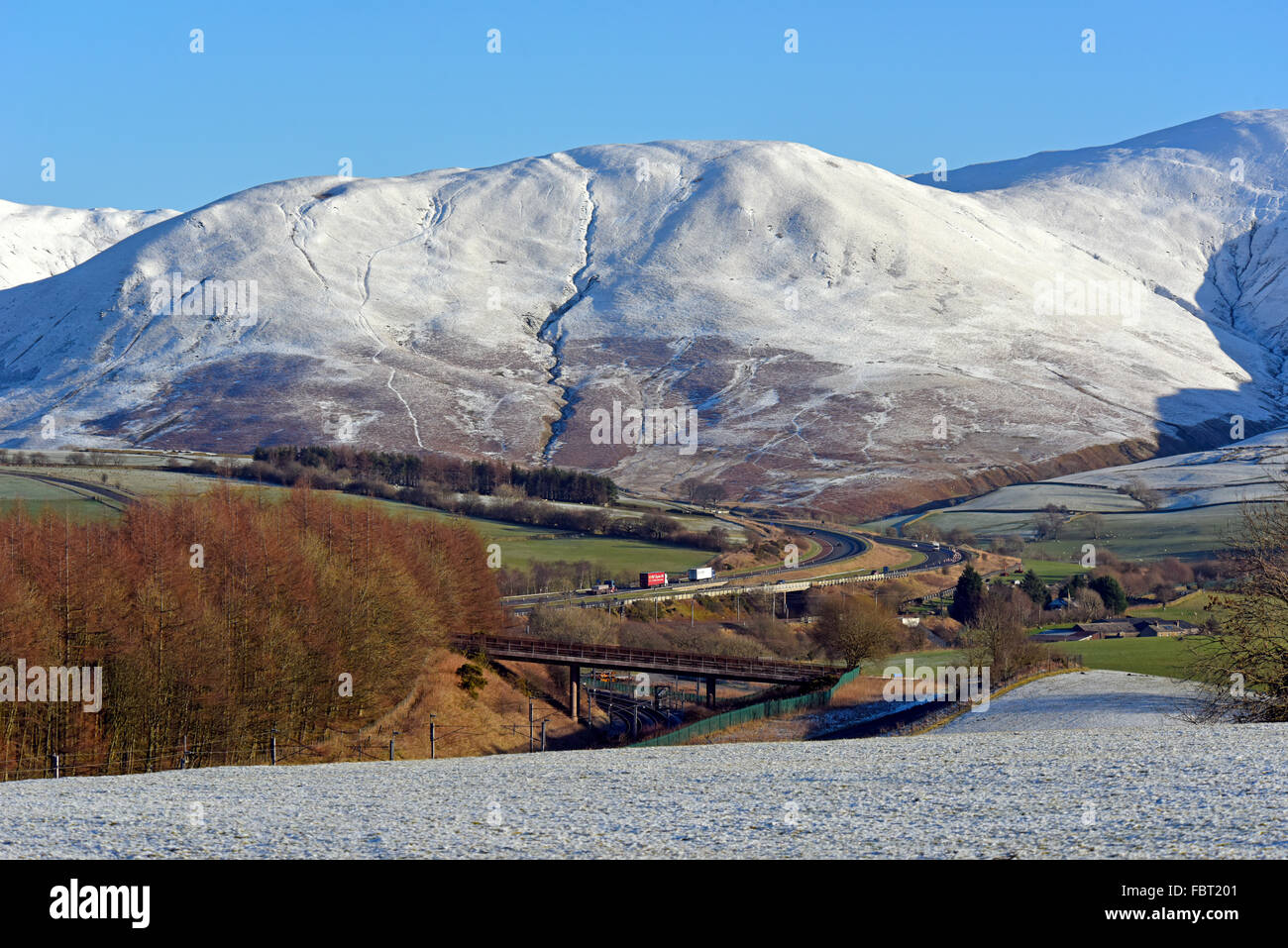 M6 Motorway and West Coast Main Line.The Howgill Fells and the Lune ...