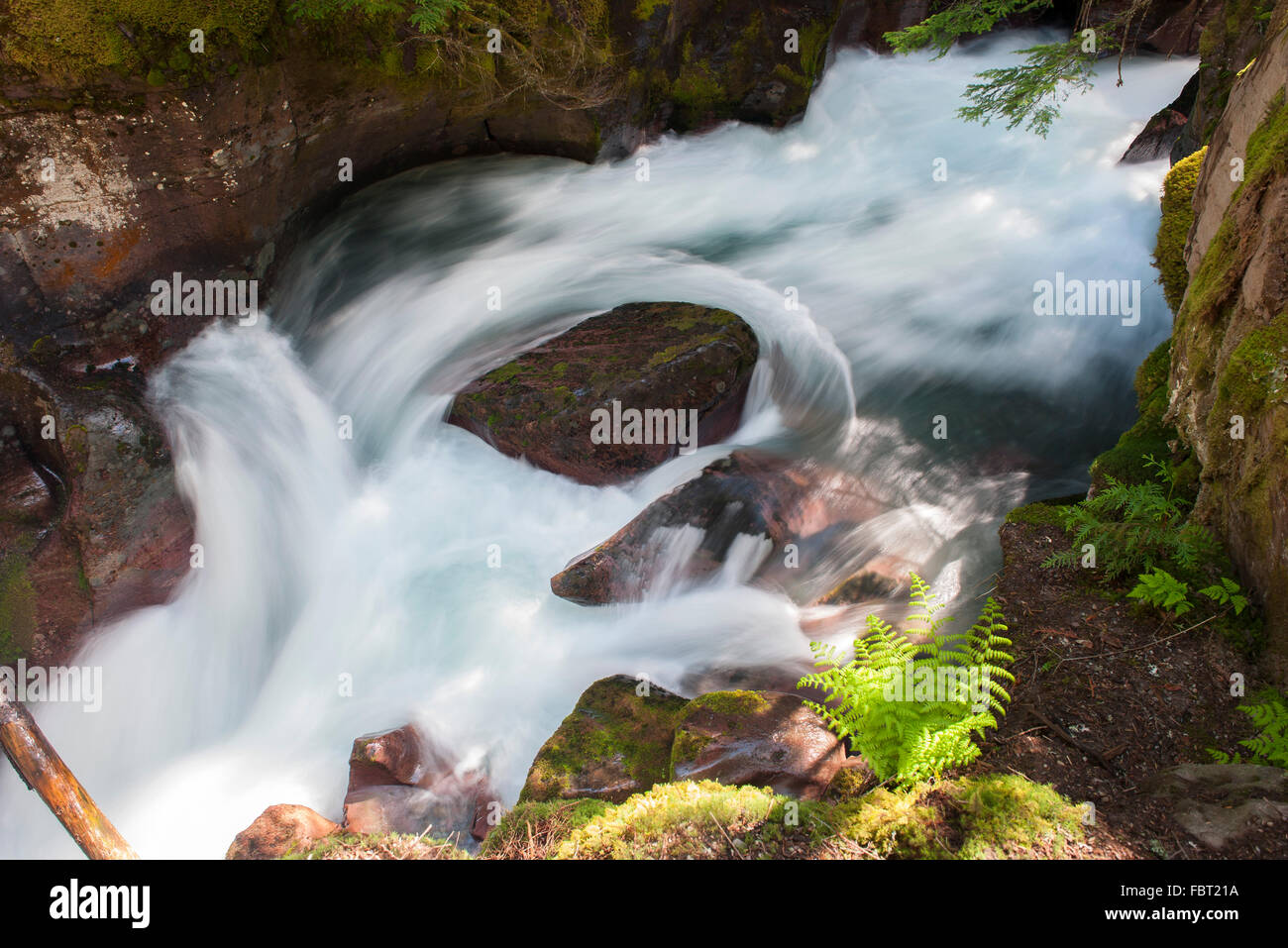 White water rushing over rocks Stock Photo - Alamy
