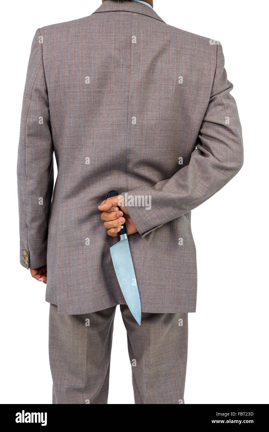 Knife behind back hi-res stock photography and images - Alamy