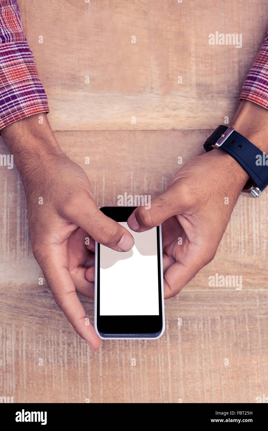 Person using smart phone on desk Stock Photo - Alamy