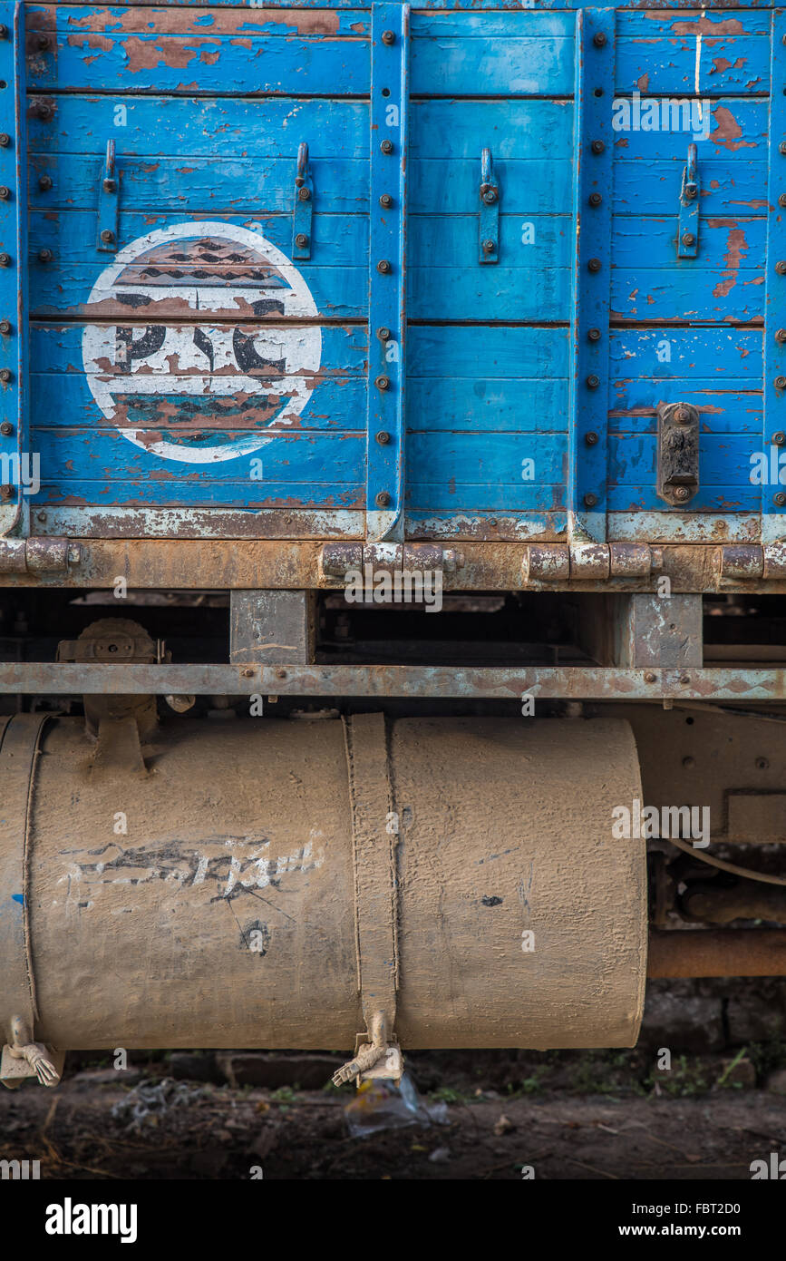 Bright blue painted Indian Tata truck detail. Muddy and worn painted ...