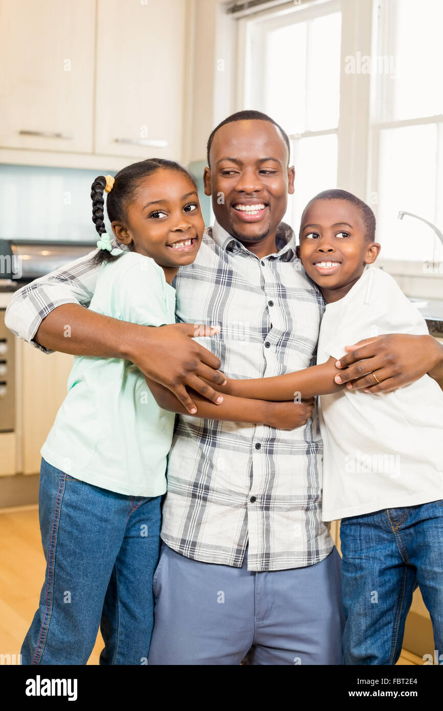 Happy family hugging hi-res stock photography and images - Alamy