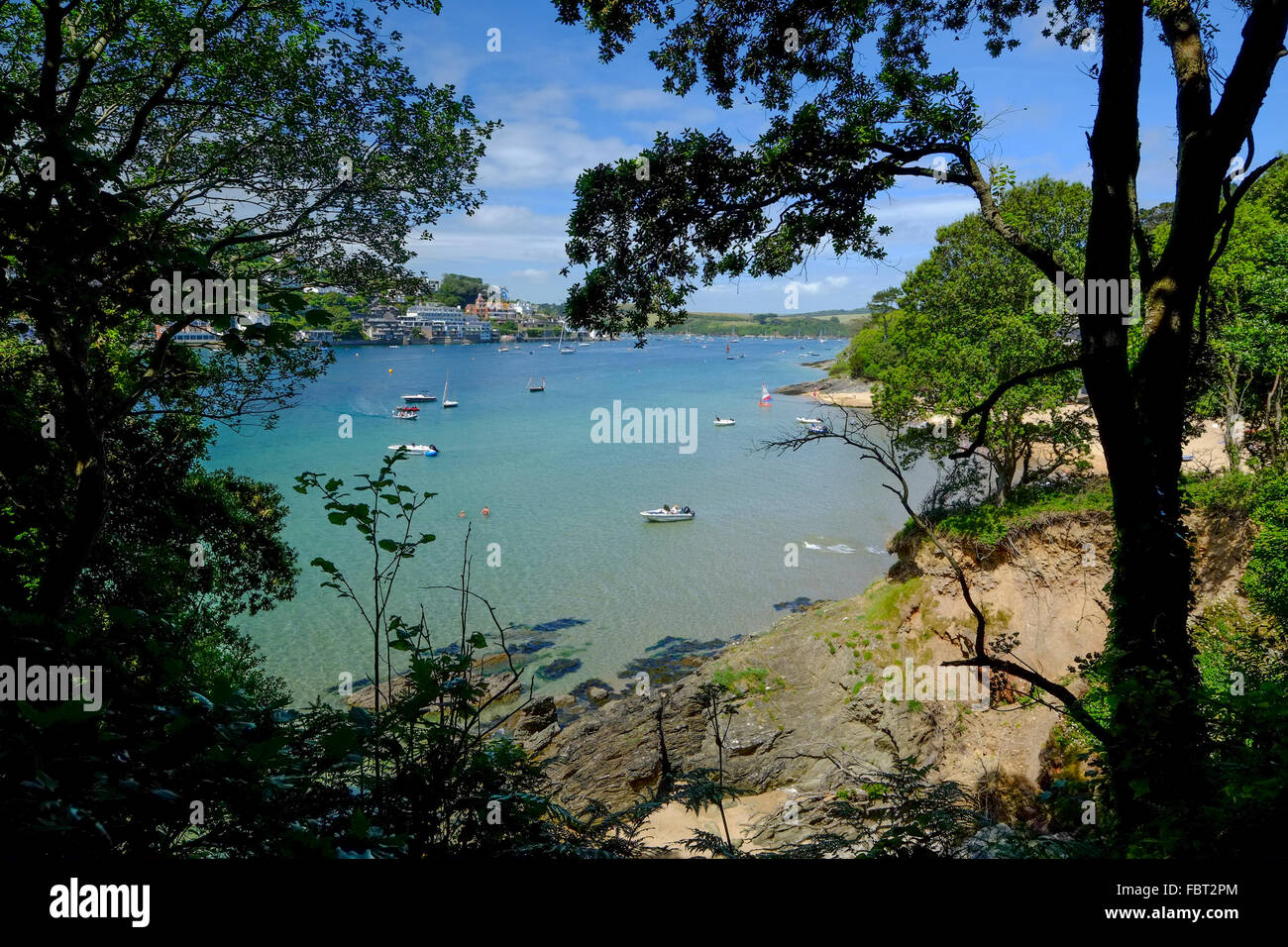 Salcombe, Devon, UK. View through the trees on the coastal path to the ...