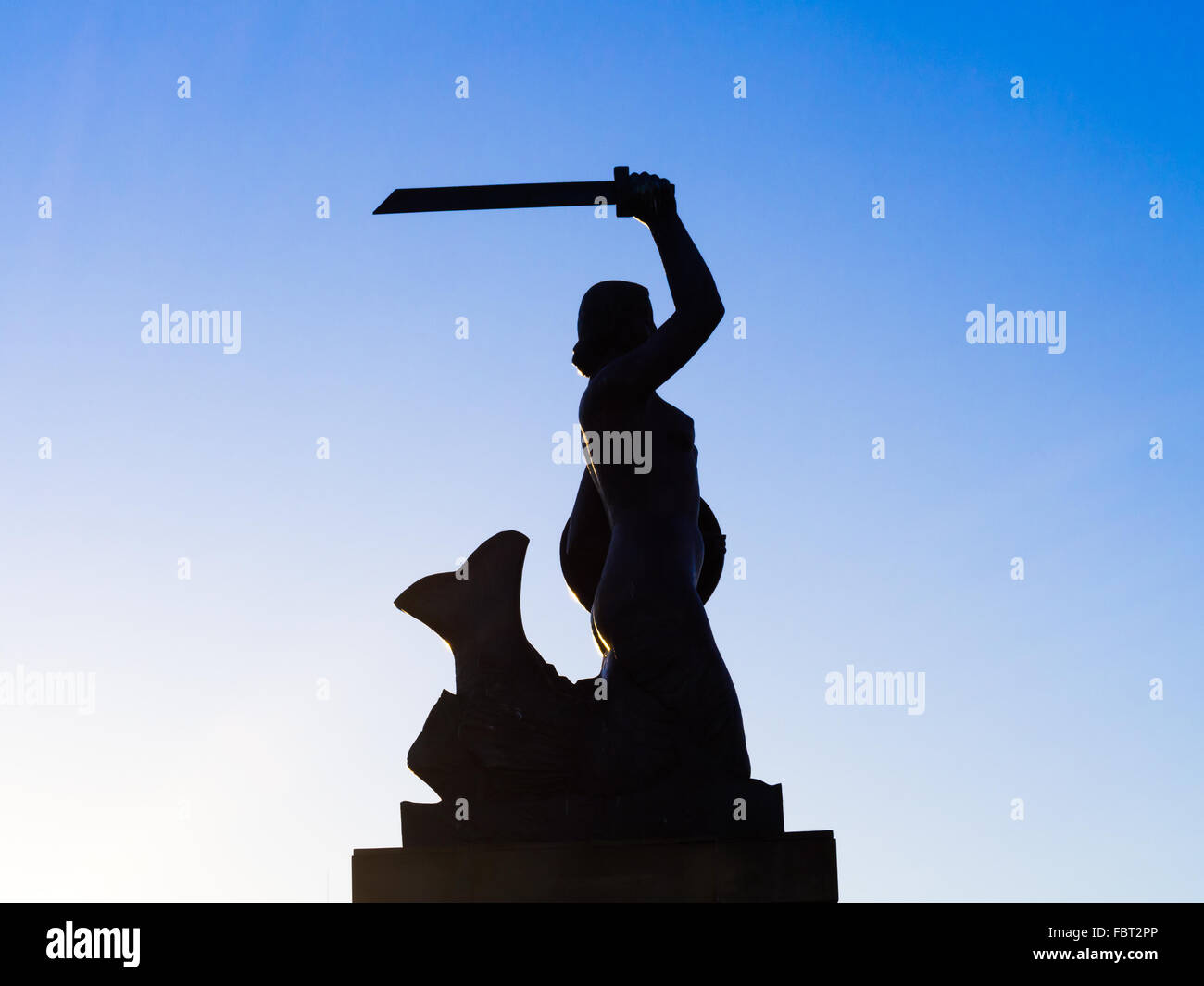 The Warsaw Mermaid called Syrenka on the Vistula River bank in Poland ...