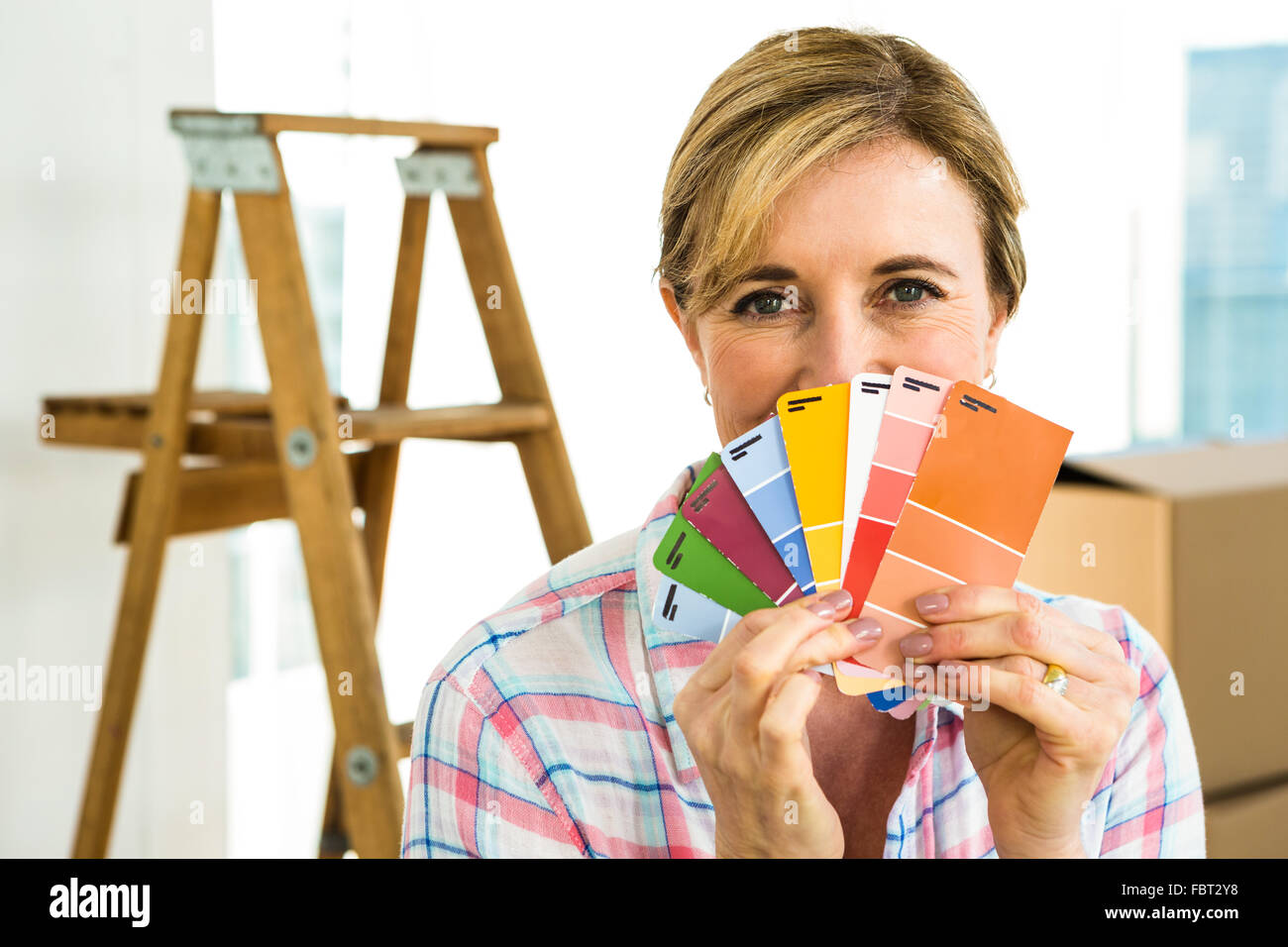 woman showing color samples Stock Photo - Alamy