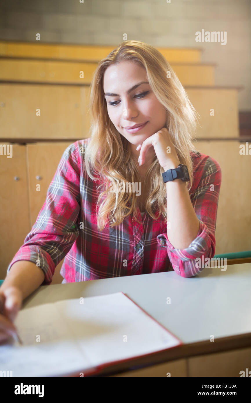 Smiling female student during class Stock Photo - Alamy