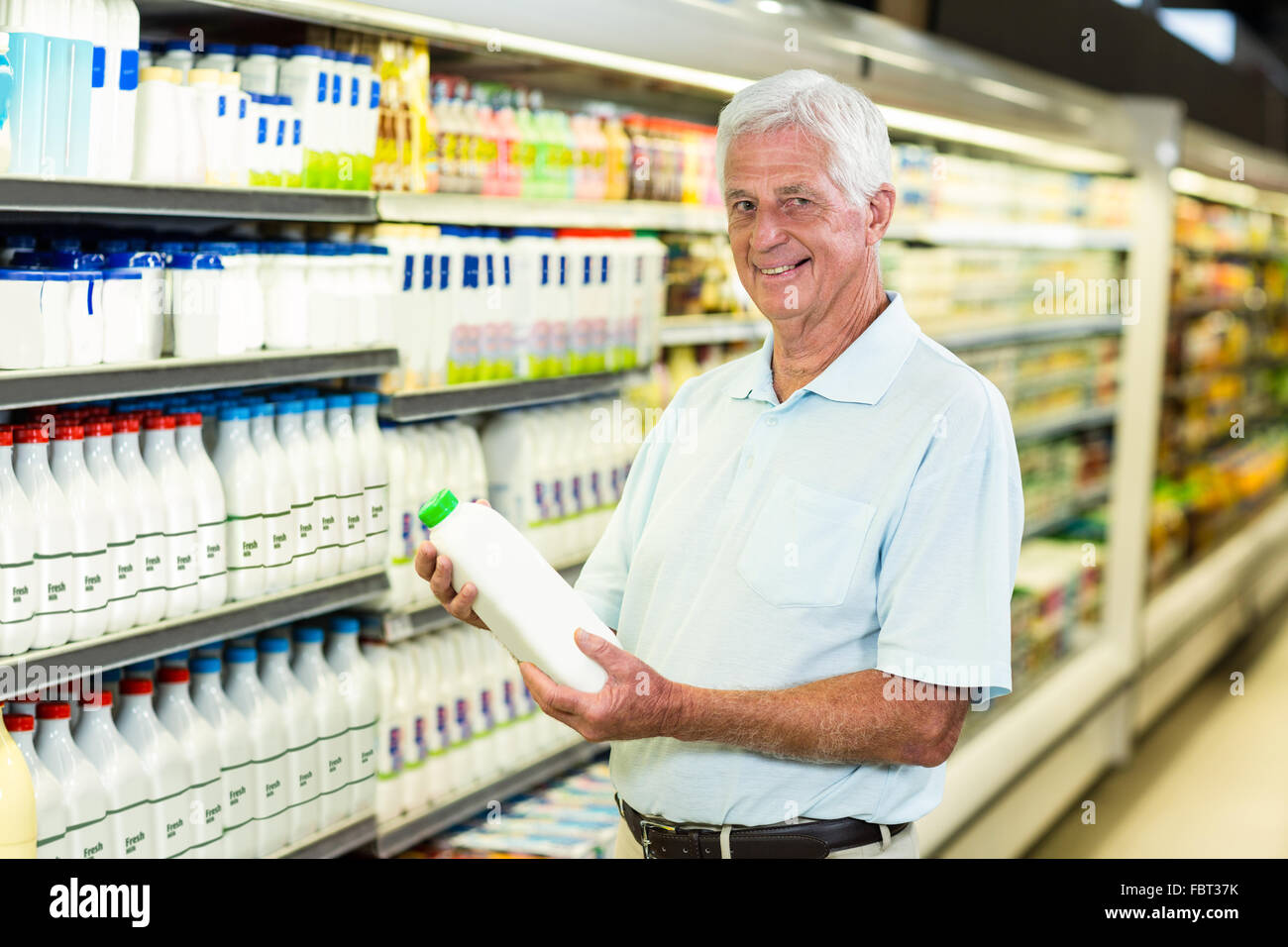 Man milk supermarket aisle hi-res stock photography and images - Alamy