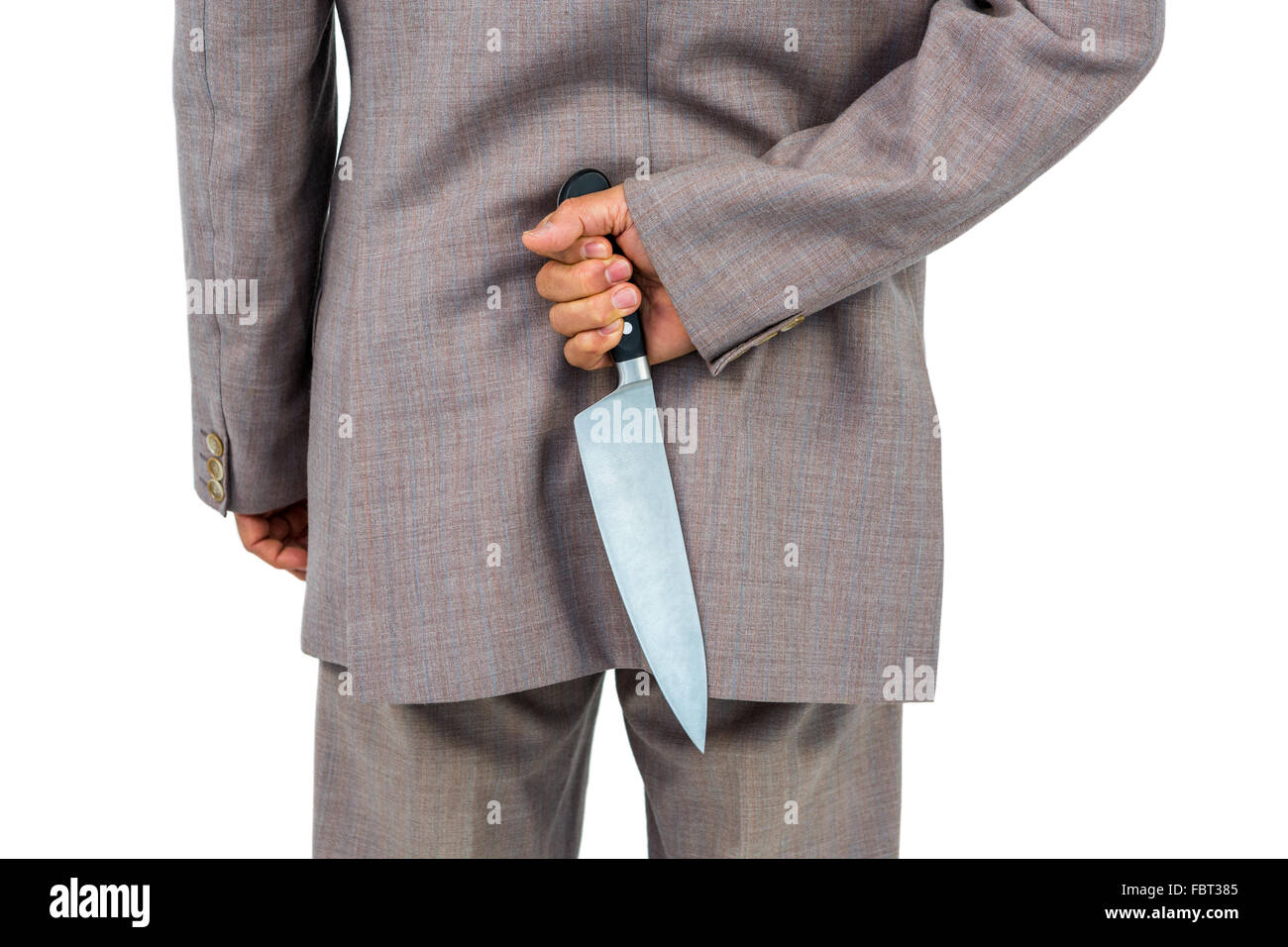 Knife behind back hi-res stock photography and images - Alamy