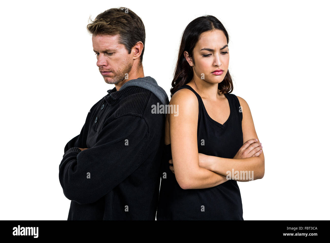 Angry couple standing over white background Stock Photo - Alamy