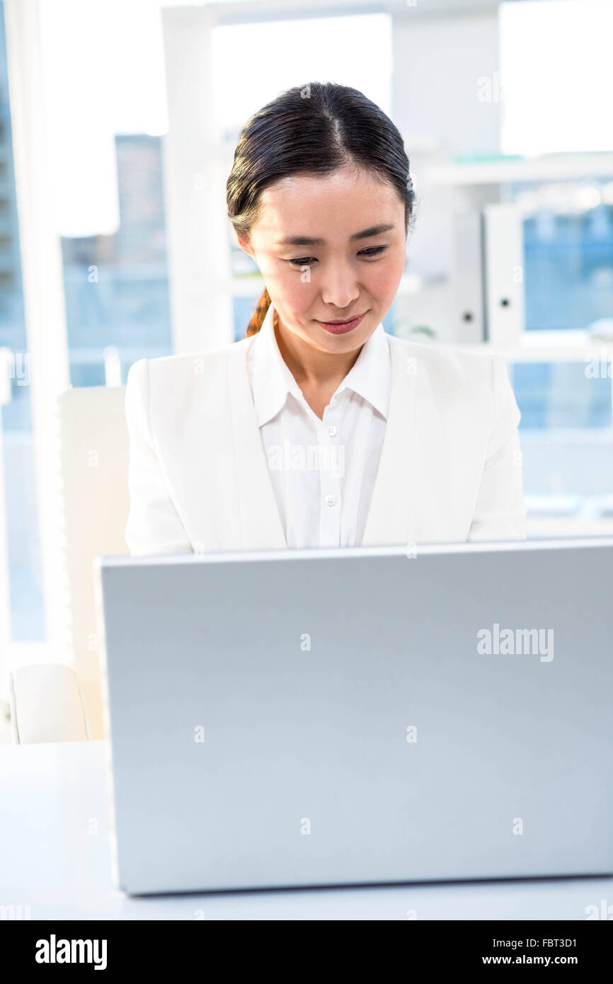 Happy chinese businesswoman working desk hi-res stock photography and ...