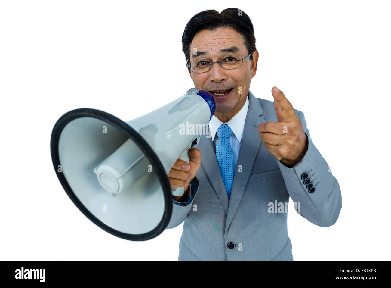 Asian businessman talking through megaphone Stock Photo - Alamy