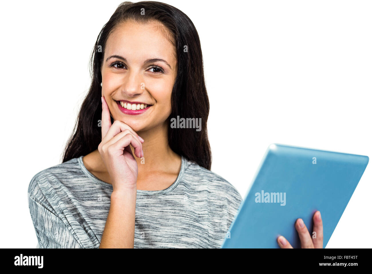 Smiling woman using tablet Stock Photo - Alamy