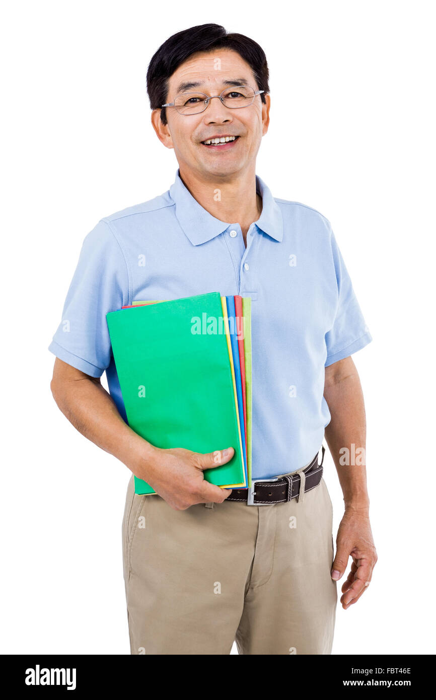 Portrait of happy businessman with files Stock Photo - Alamy