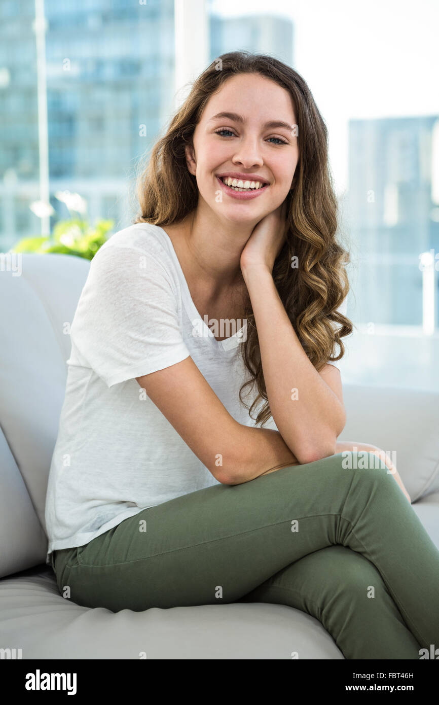 Happy woman smiling at the camera Stock Photo - Alamy