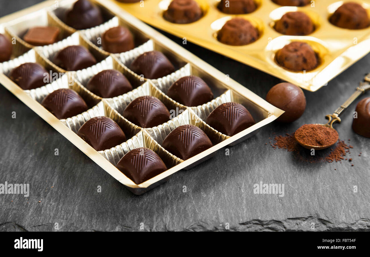 Chocolate pralines assortment with cocoa powder,sweet and tasty dessert ...