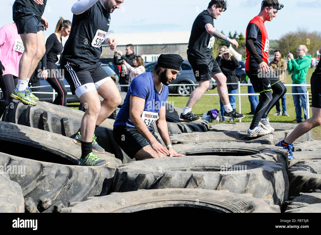 Runners at obstacle course race, UK Stock Photo - Alamy