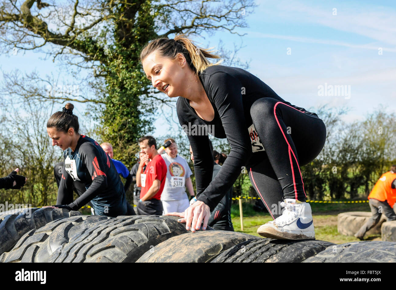 Runners at obstacle course race, UK Stock Photo - Alamy