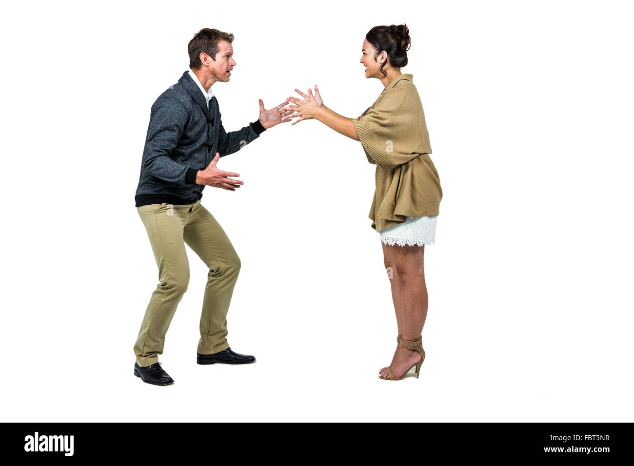 Full length of couple arguing Stock Photo - Alamy