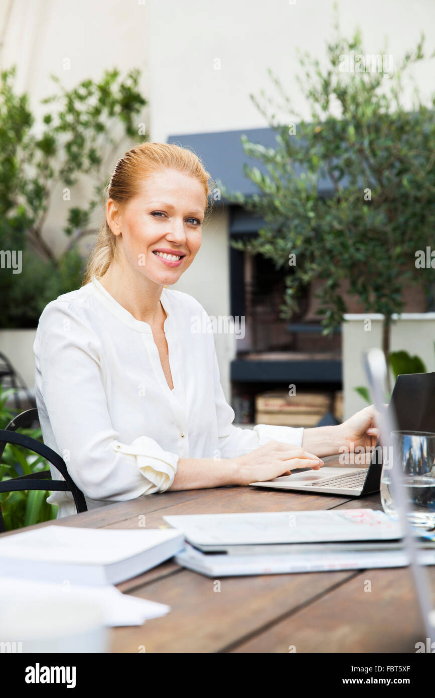 Businesswoman working, portrait Stock Photo - Alamy
