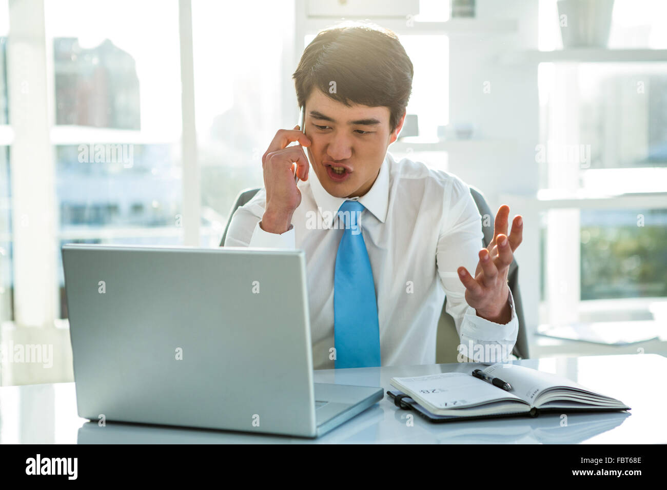 Businessman busy working on computer hi-res stock photography and ...