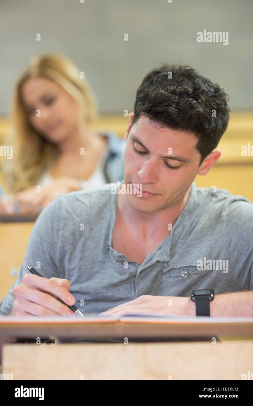Serious male student during class Stock Photo - Alamy