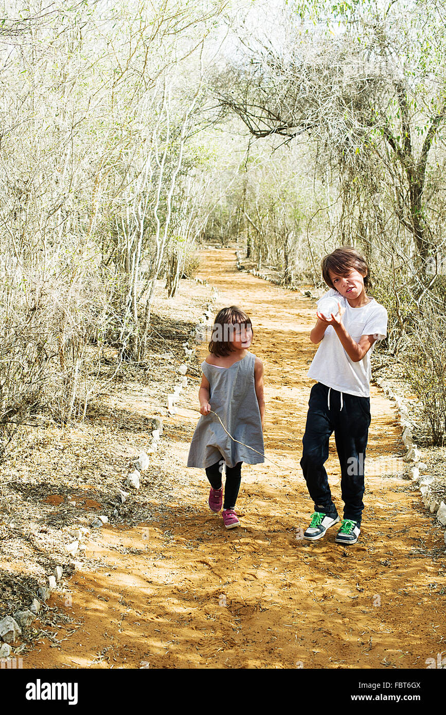 Children walking together on path Stock Photo - Alamy