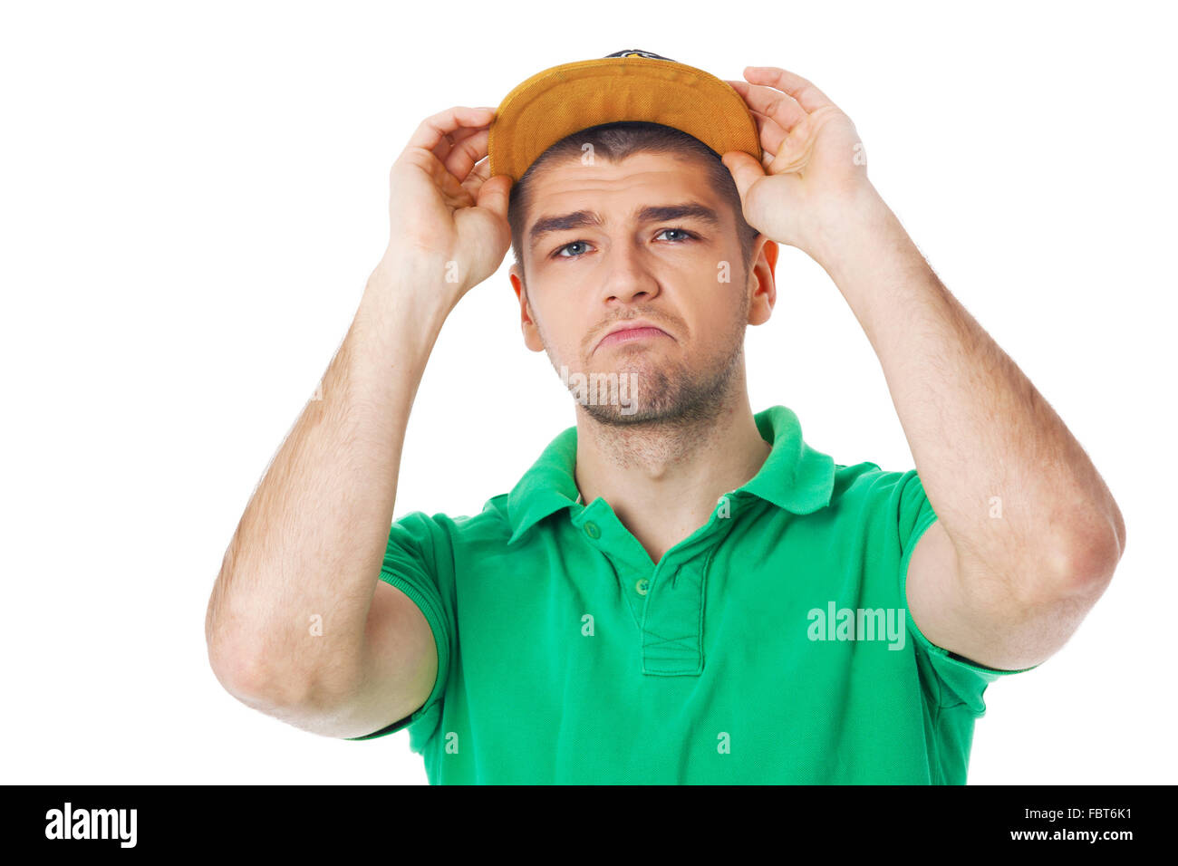 Not Bad! Young cool looking man posing in studio Stock Photo - Alamy