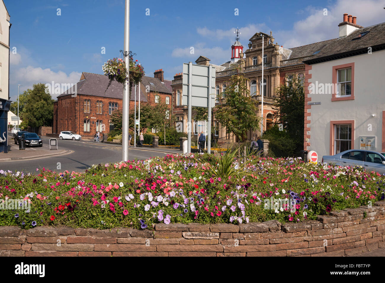 Penrith, Town Hall and flowers, roundabout, Cumbria, North England, uk ...