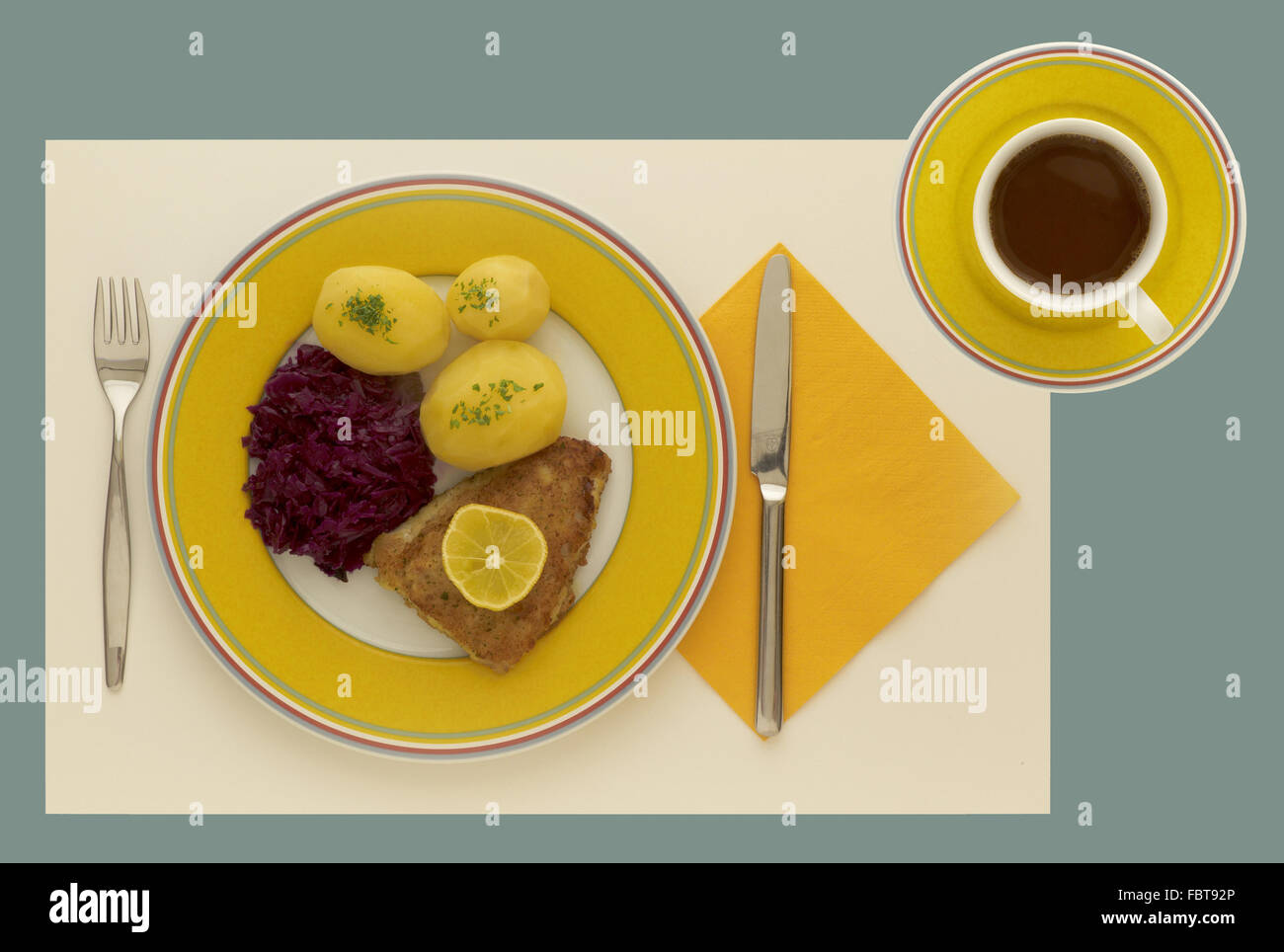 Fish, potatoes, red cabbage and coffee Stock Photo - Alamy