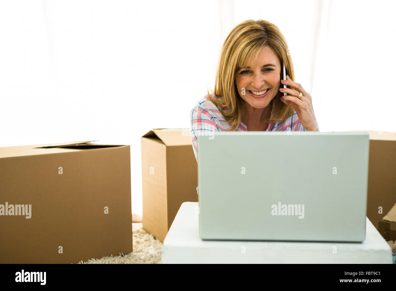 Woman calling someone Stock Photo - Alamy