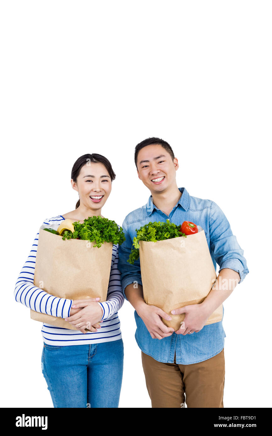 Chinese man holding shopping bags hi-res stock photography and images ...