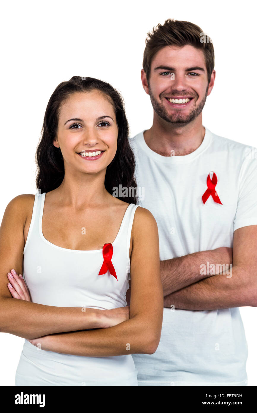 Smiling couple with red ribbon Stock Photo - Alamy