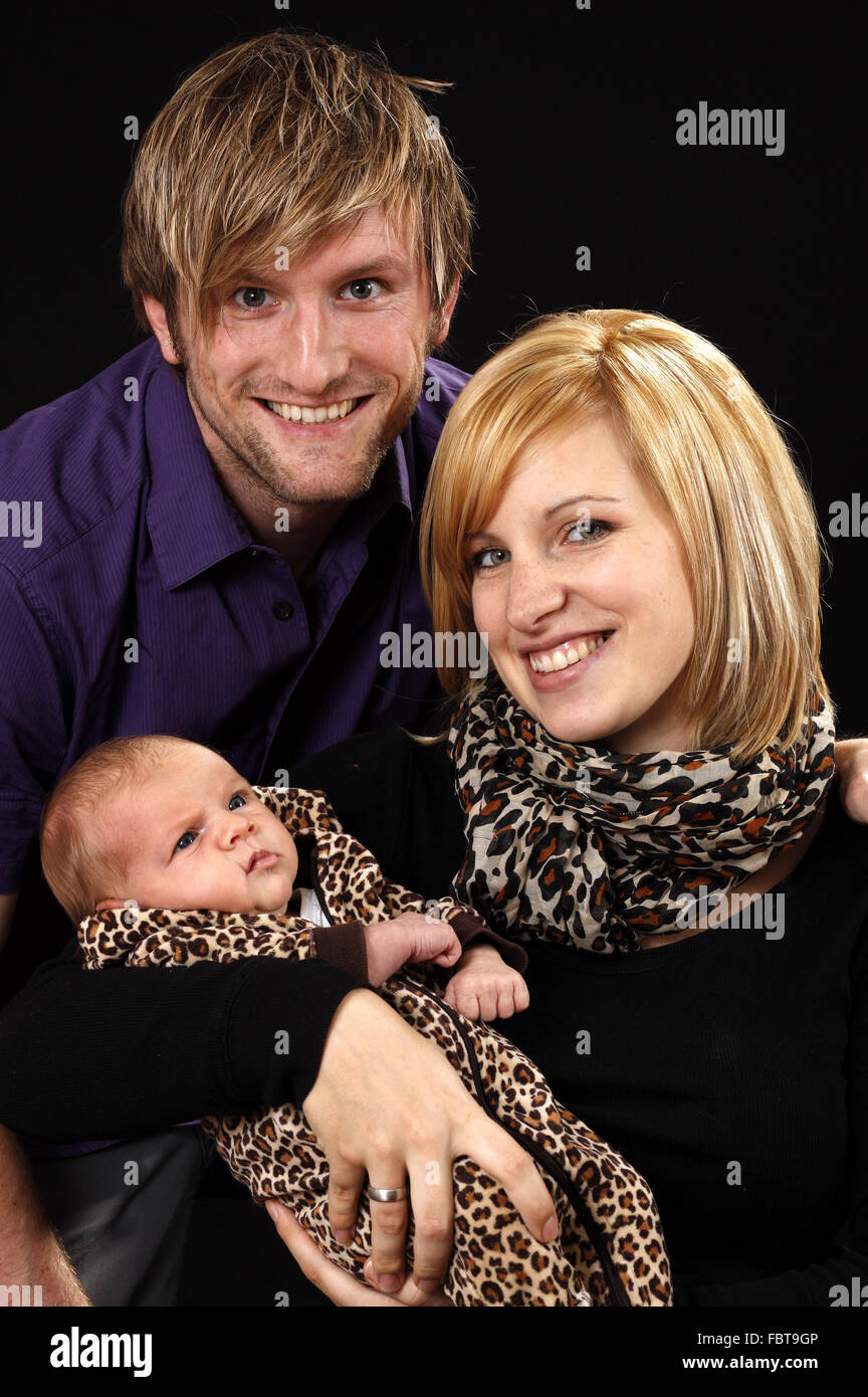 Parents with their baby Stock Photo - Alamy